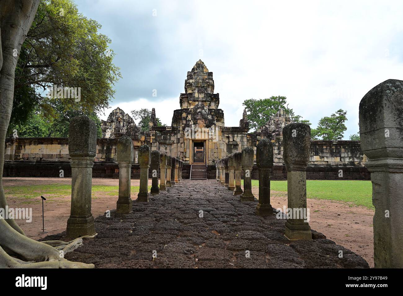 Laterite walkway decorated with large stone pillars (Sao Nang Riang ...