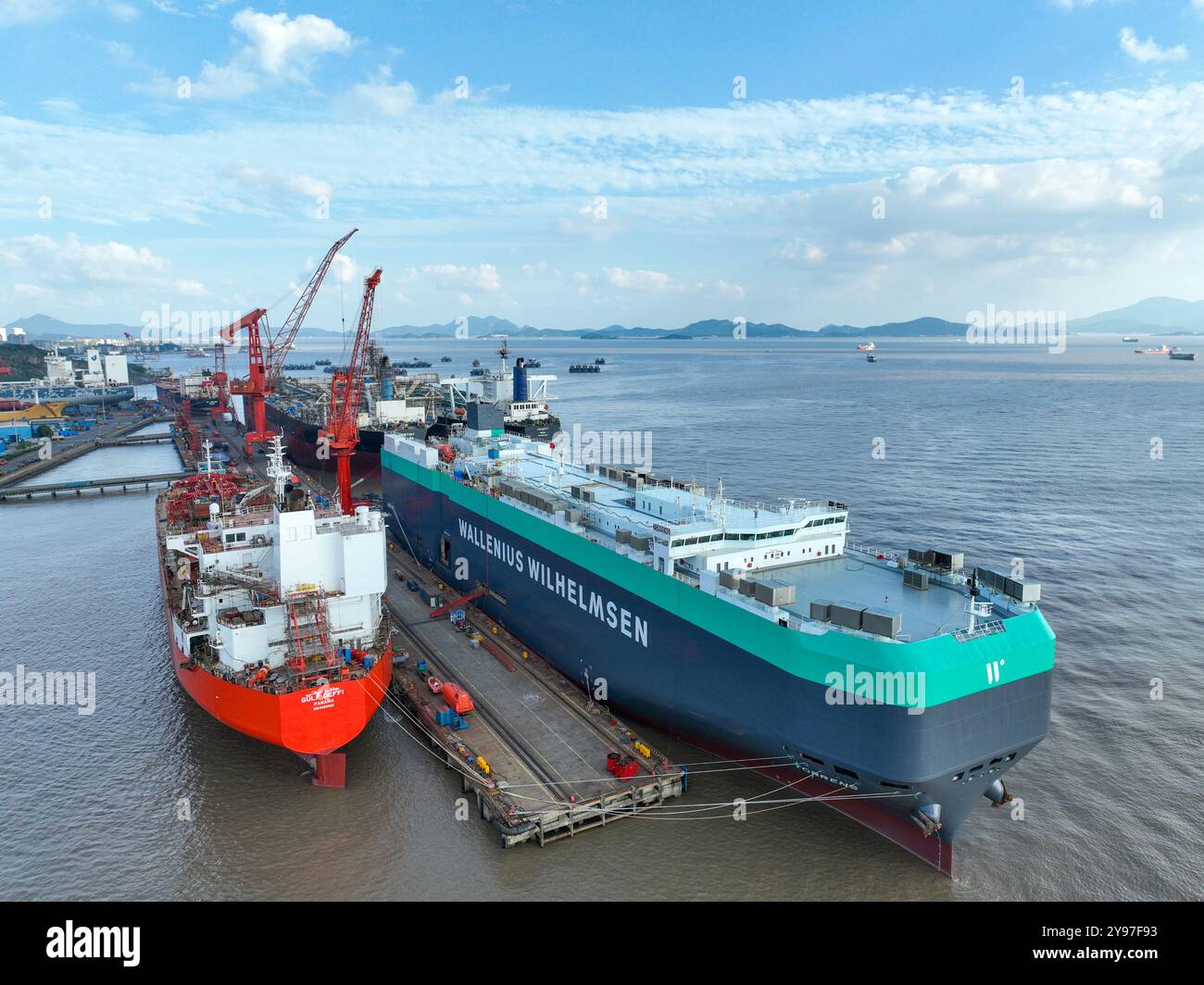 ZHOUSHAN, CHINA - OCTOBER 9, 2024 - Workers at a ship maintenance ...