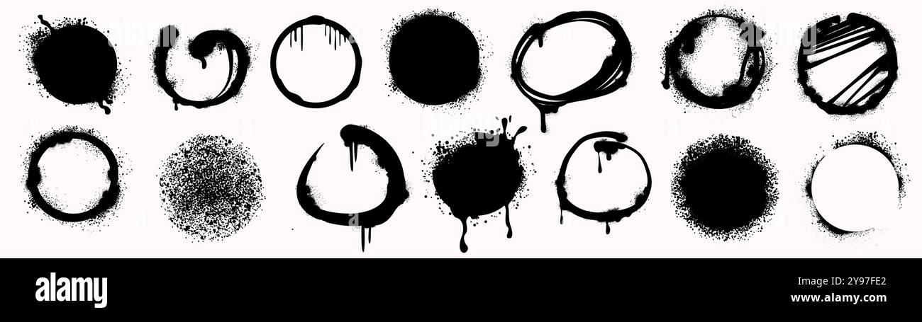 Spray paint black circles with drips, blots and ink splatters in street ...