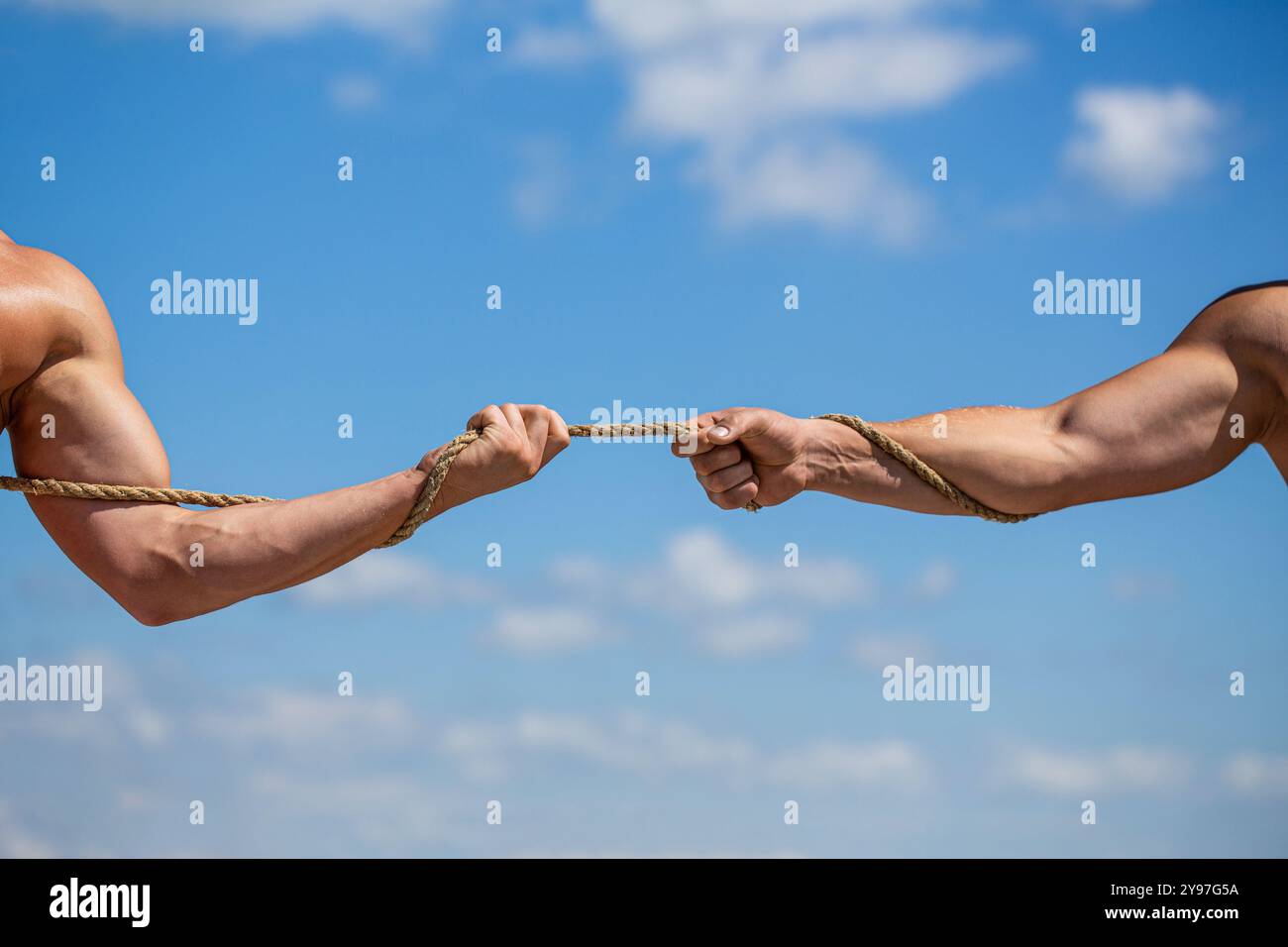 Two hands, helping hand, arm, friendship. Rope, cord. Hand holding a rope, climbing rope ...