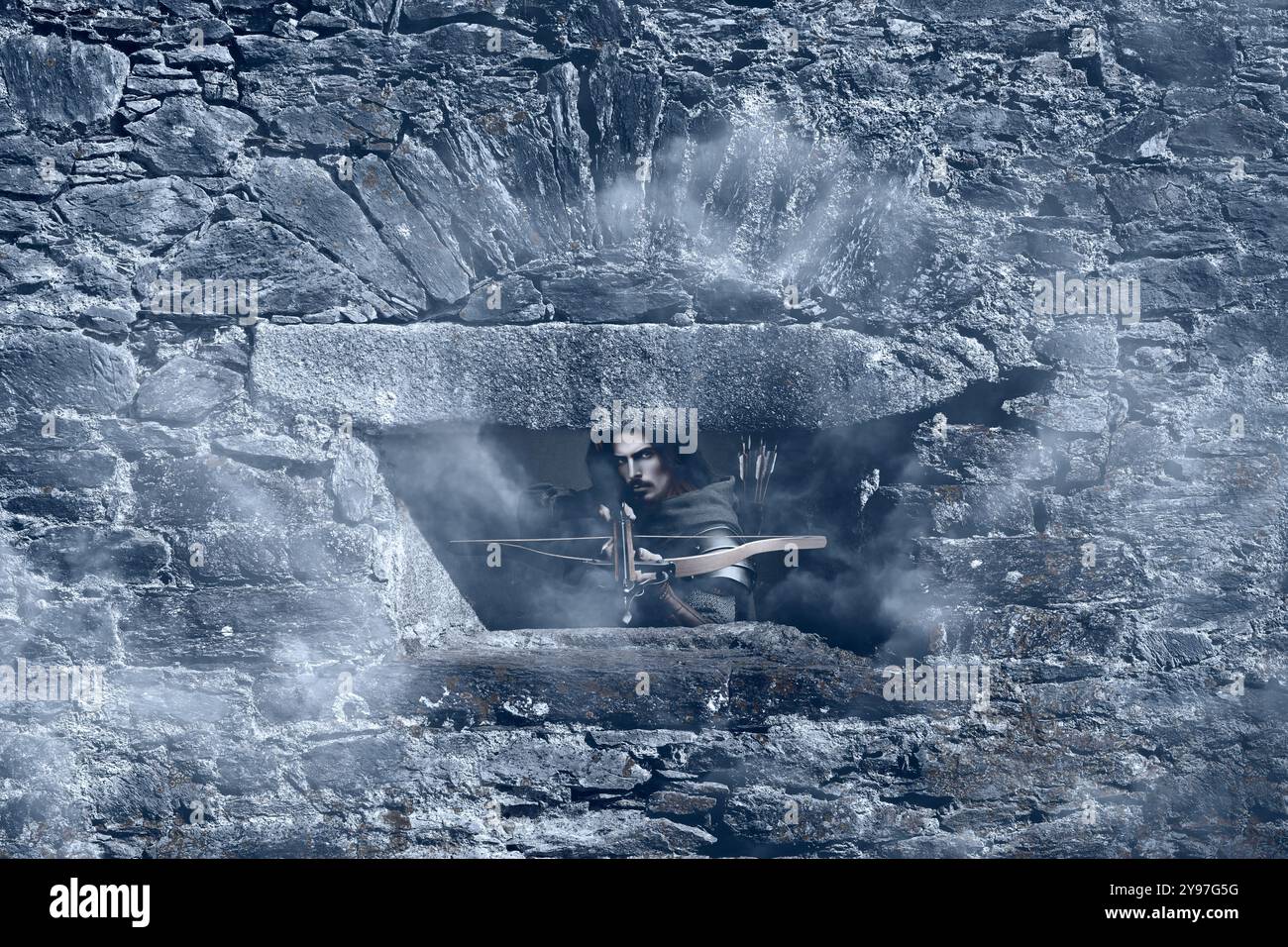 Medieval archer with a crossbow in a fortress window under siege Stock ...