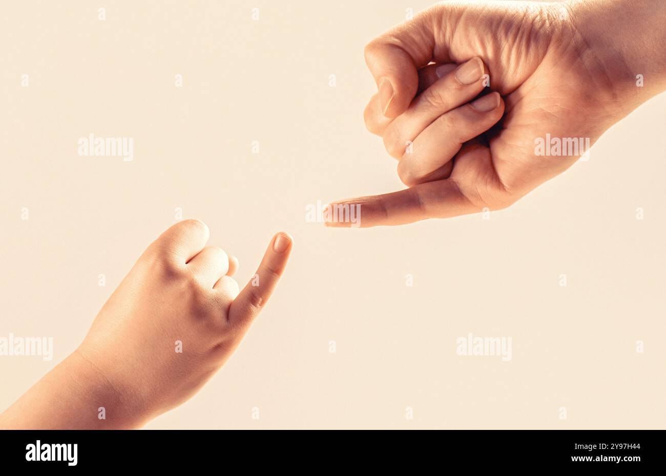 Child hook little finger together. Little finger of the two hands hold ...