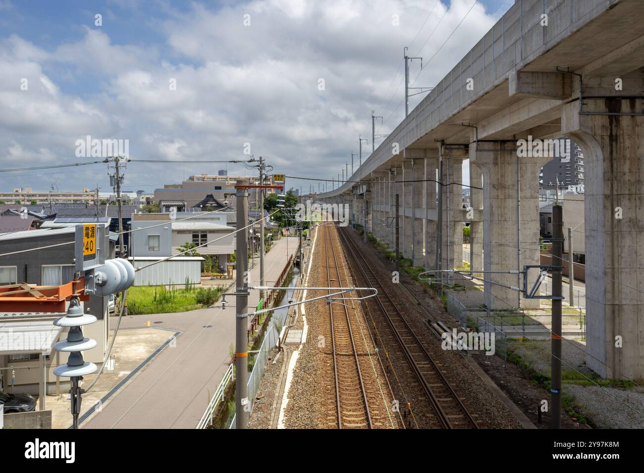 Shinkansen railway track, the Tsuruga to Kanazawa line, raised on ...