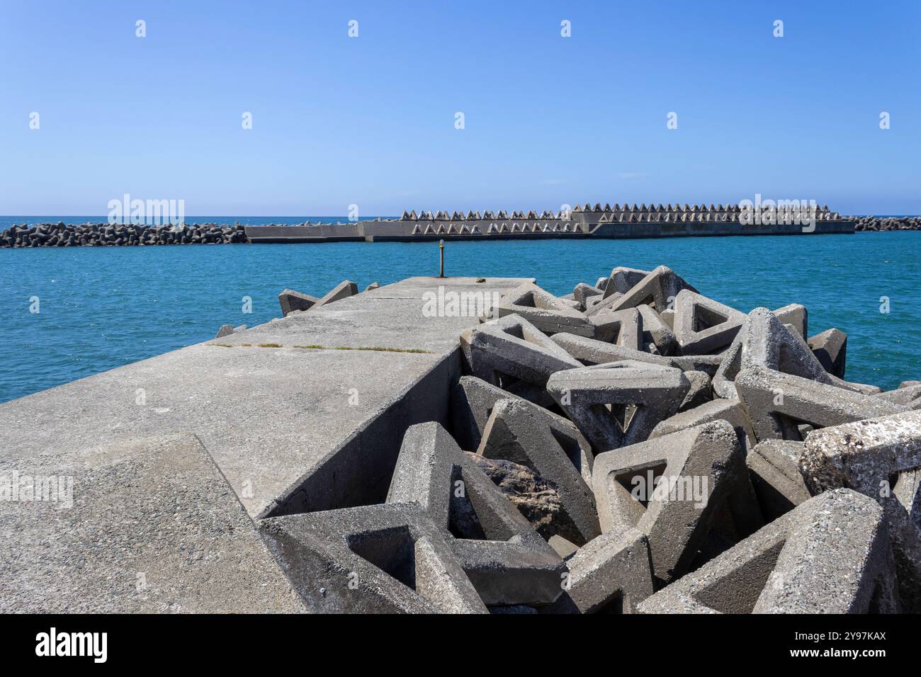 Triangular concrete breakwater blocks at Hashidate Fishing Port ...