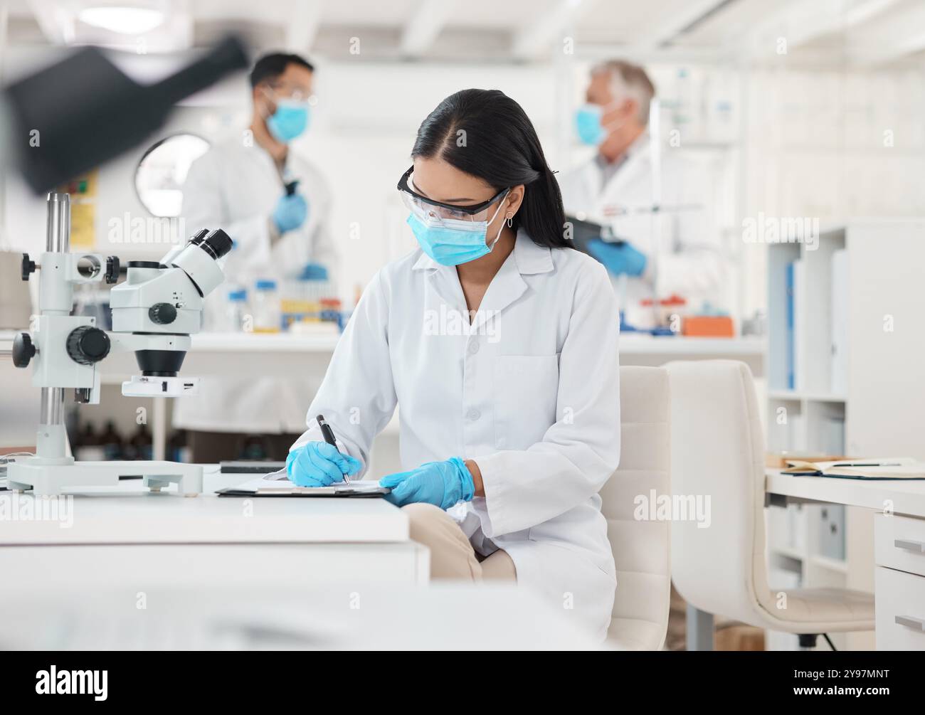 Lab, writing and microscope research for vaccine study and mask for ...