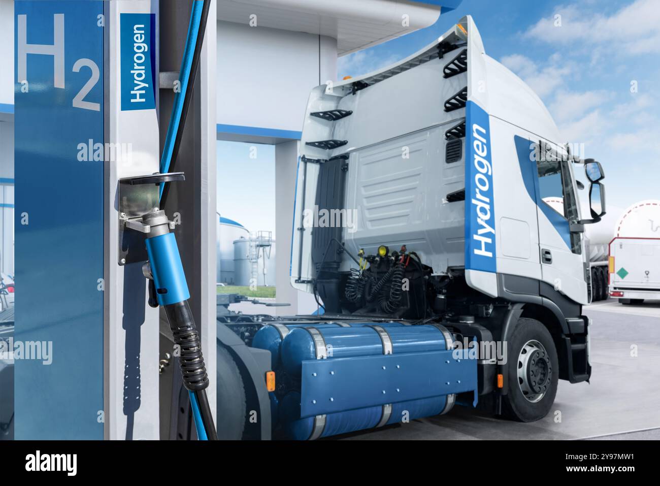 A hydrogen fuel cell semi truck with H2 gas cylinder onboard next to ...
