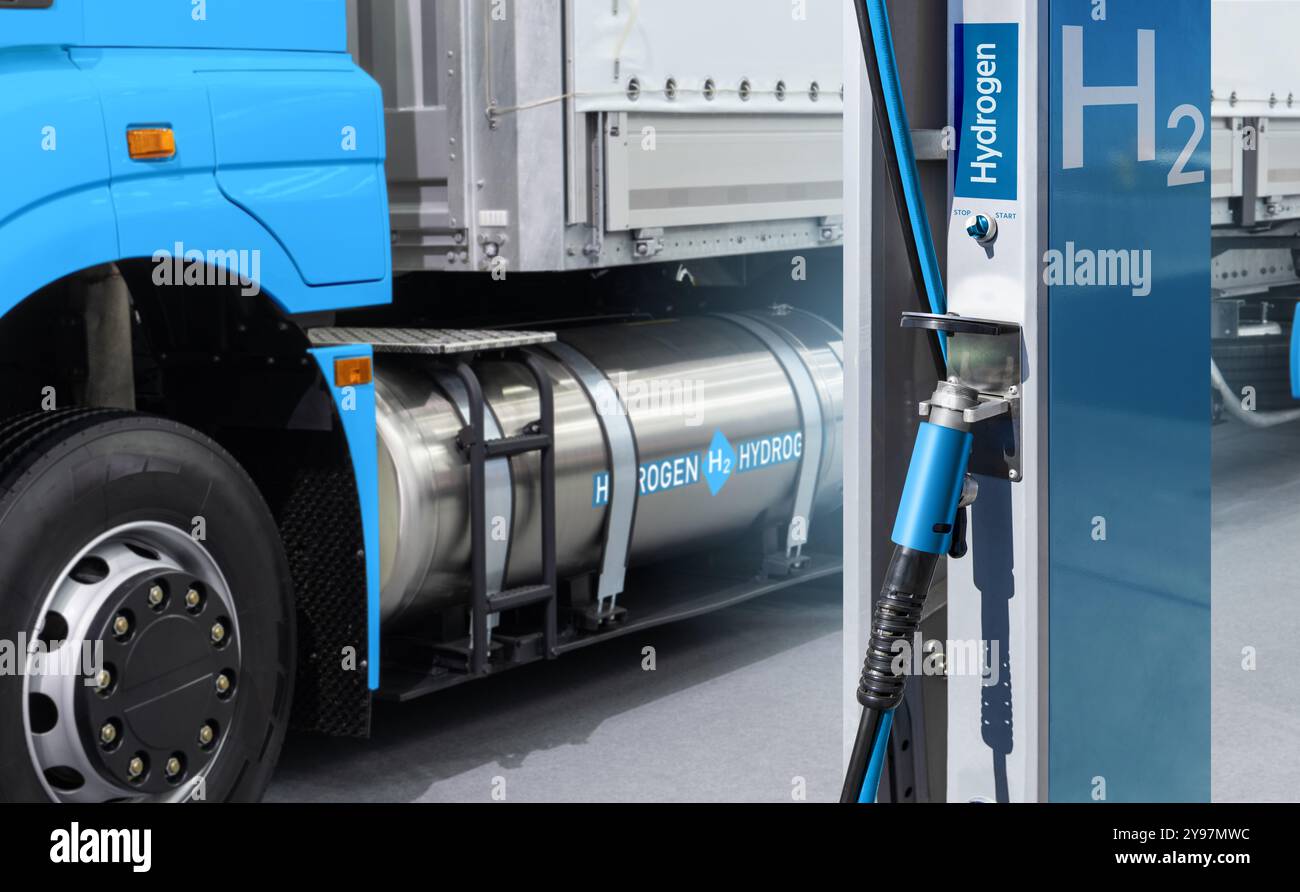 A hydrogen fuel cell semi truck with H2 gas cylinder onboard next to ...