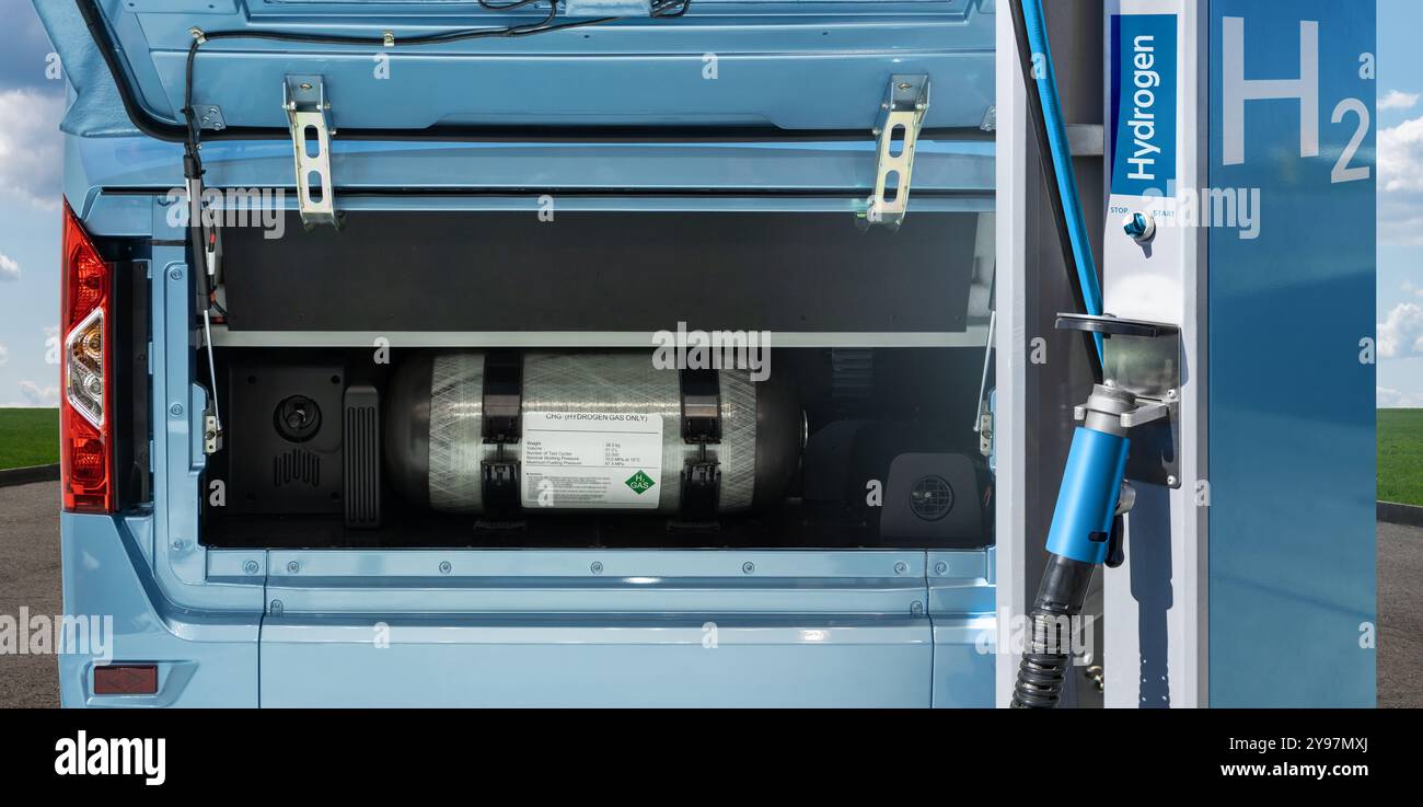Hydrogen gas station and bus with an open hood and a hydrogen cylinder ...