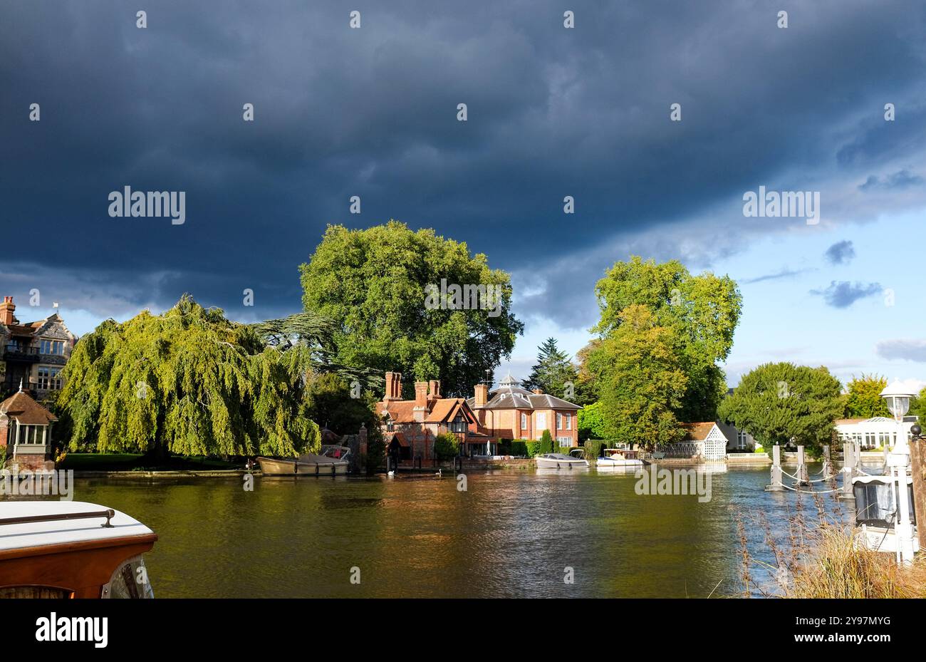 View across the River Thames to riverside homes around Marlow ...