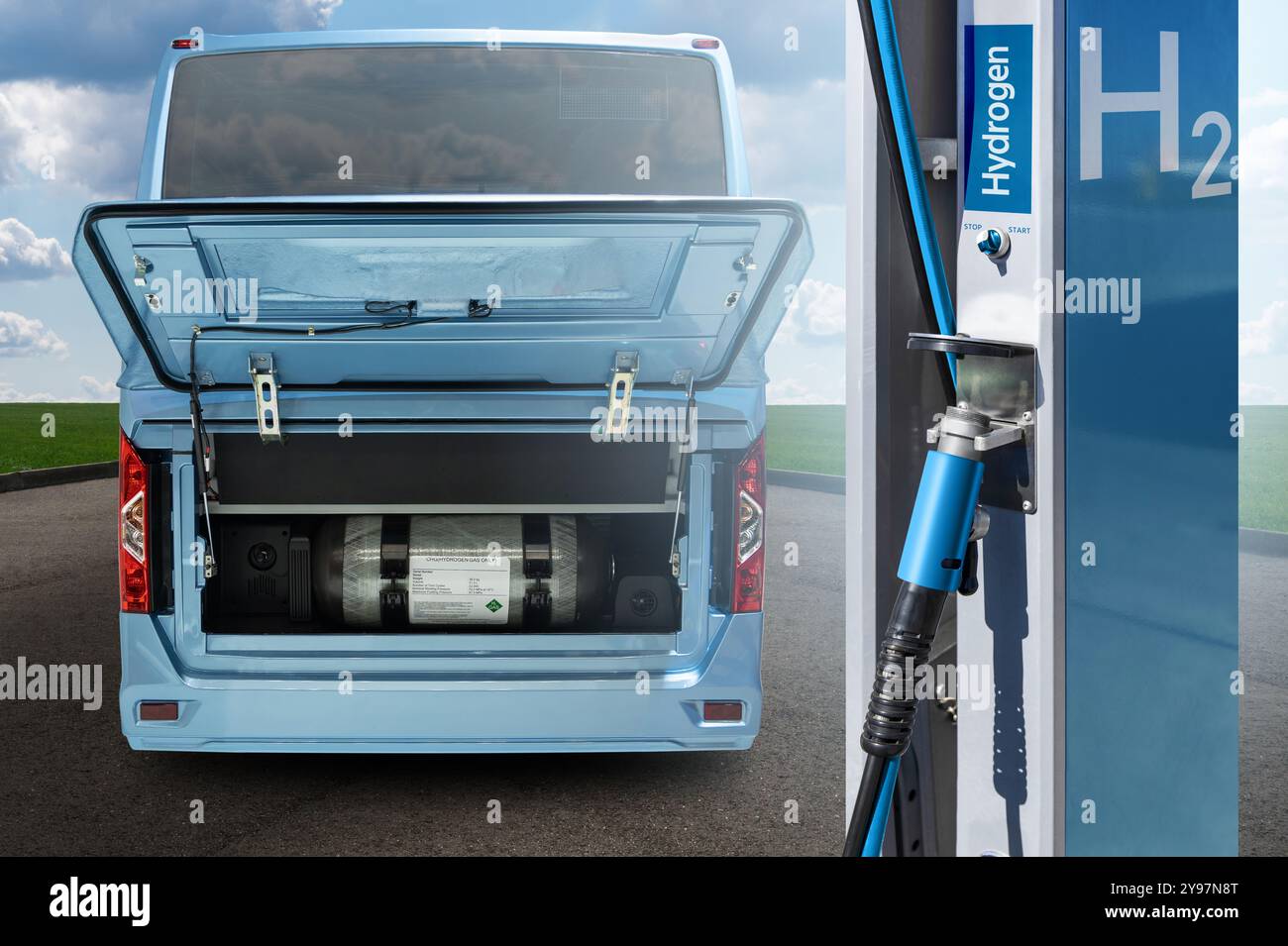 Hydrogen gas station and bus with an open hood and a hydrogen cylinder ...