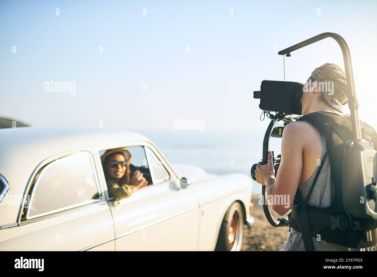 Filmmaking, camera and retro car for beach photoshoot, video analysis ...