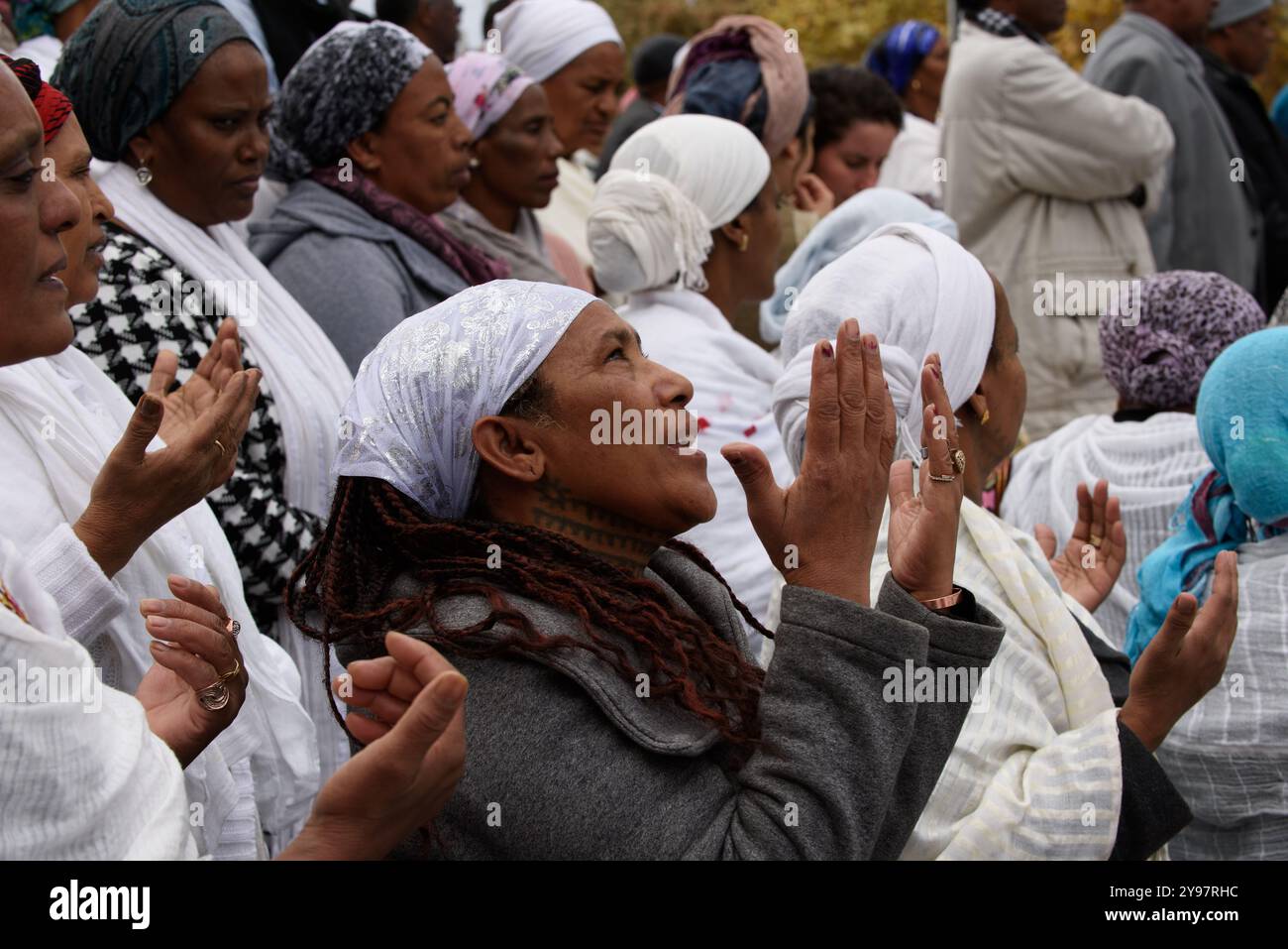 African woman praying hi-res stock photography and images - Alamy