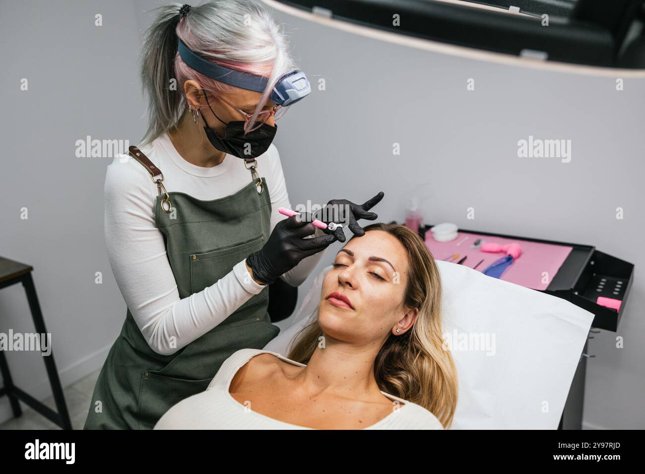 Professional microblading procedure in modern beauty salon Stock Photo ...