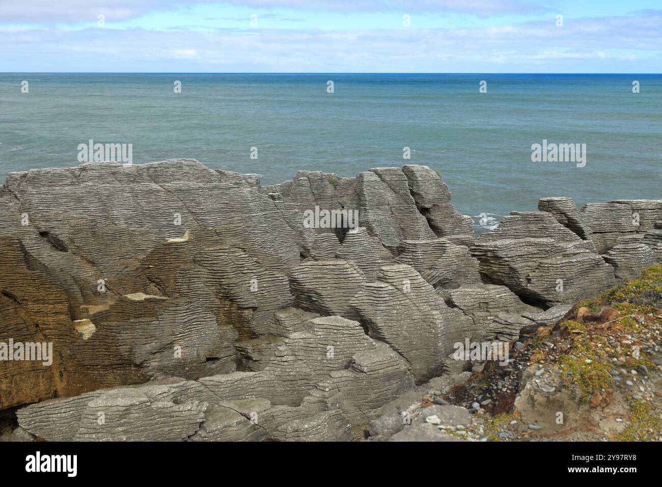 Distinctive limestone landscape of pancake shaped rock formations at ...