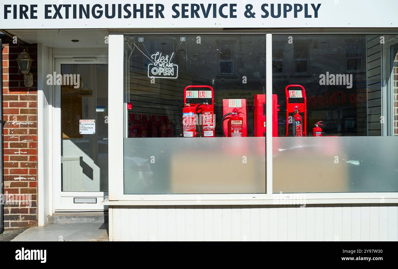 Most boring shop window displaying red fire extinguishers Stock Photo ...