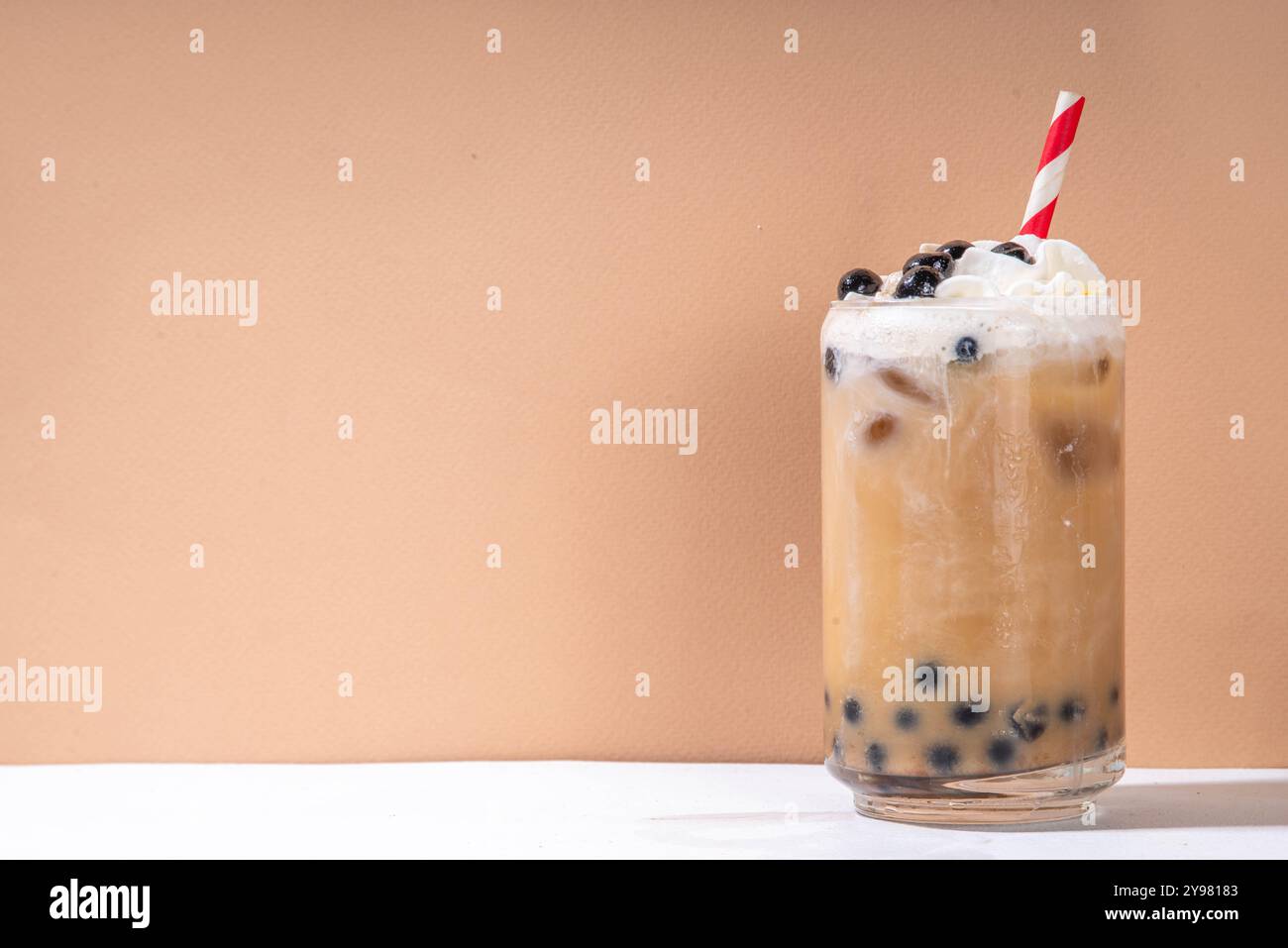 Classic boba bubble tea with tapioca pearls and whipped non-dairy ...