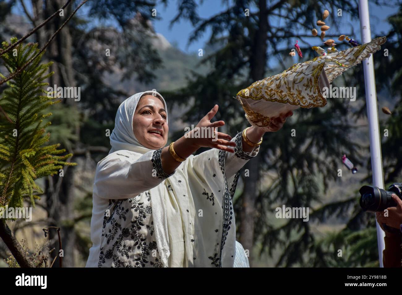 A party worker of Jammu and Kashmir National Conference (JKNC) party ...