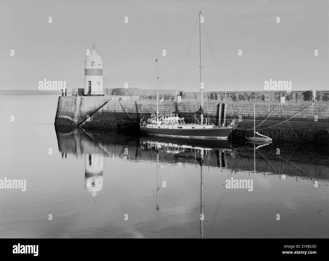Moored motor yacht in outer harbour at Castletown Stock Photo - Alamy
