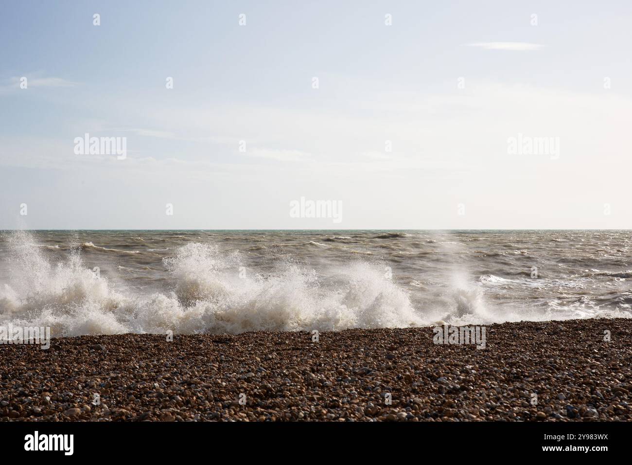Waves splashing on the beach in St Leonards on the south coast of ...