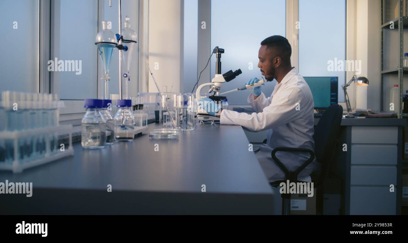 Genetic tests are conducted in medical laboratory. African American ...