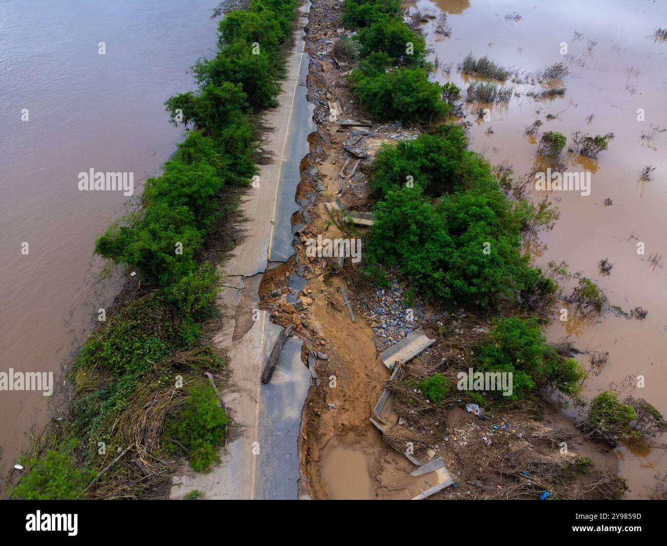 Landslides caused by heavy rains have caused the asphalt roads to crack ...