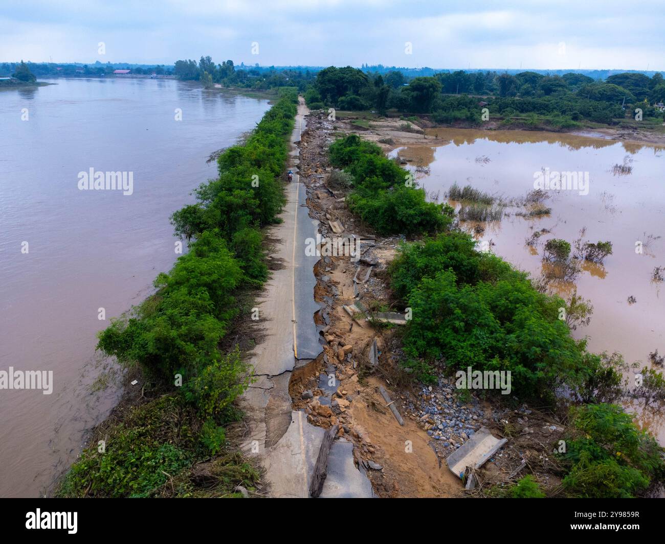 Landslides caused by heavy rains have caused the asphalt roads to crack ...