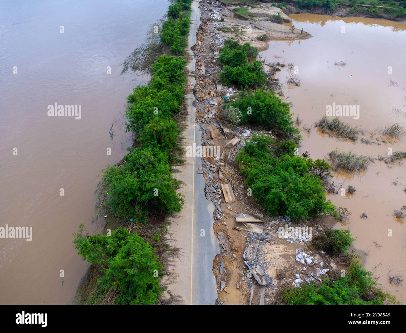 Landslides caused by heavy rains have caused the asphalt roads to crack ...