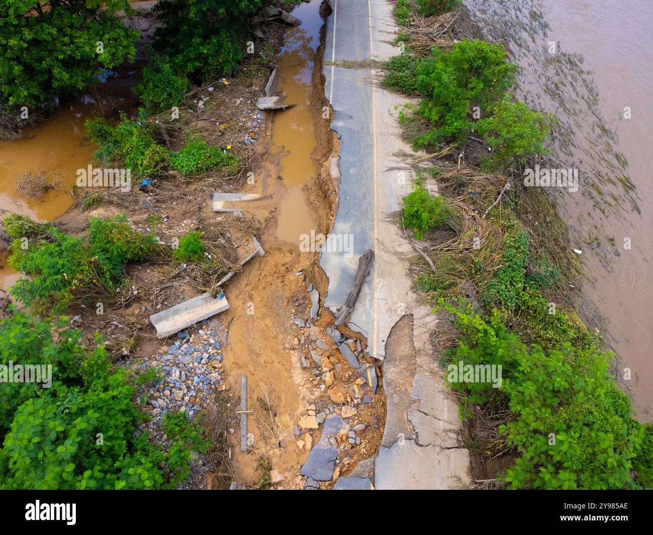 Landslides caused by heavy rains have caused the asphalt roads to crack ...