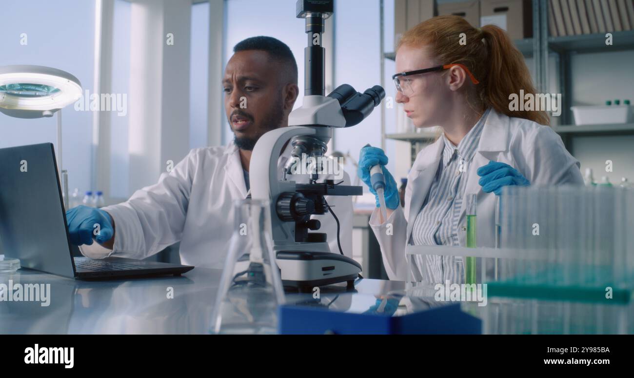 Multiethnic team of biotechnology scientists develop drugs in advanced ...