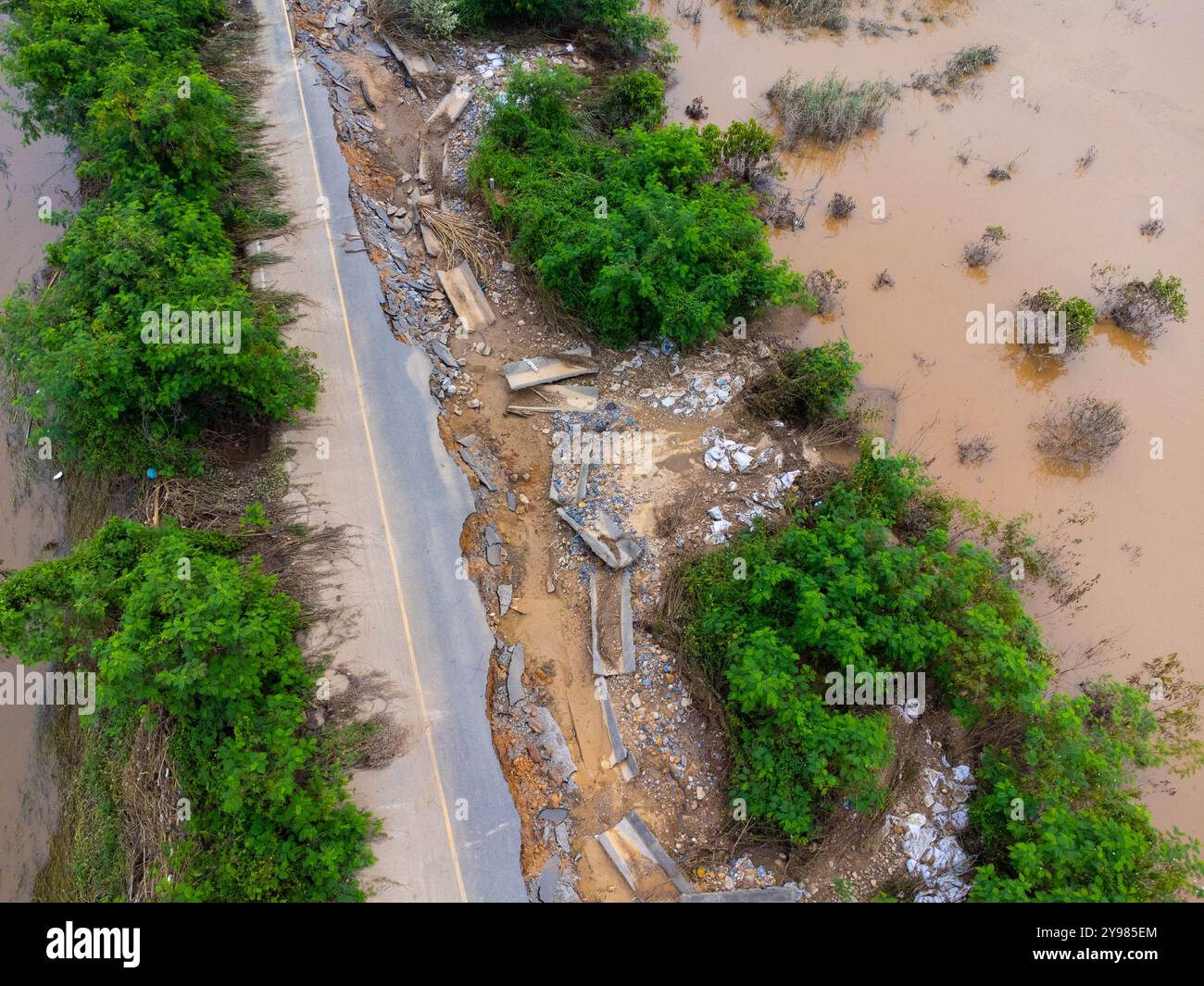 Landslides caused by heavy rains have caused the asphalt roads to crack ...