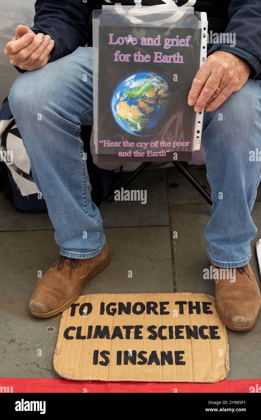 London, UK. 9 October 2024. A member of Christian Climate Action during ...