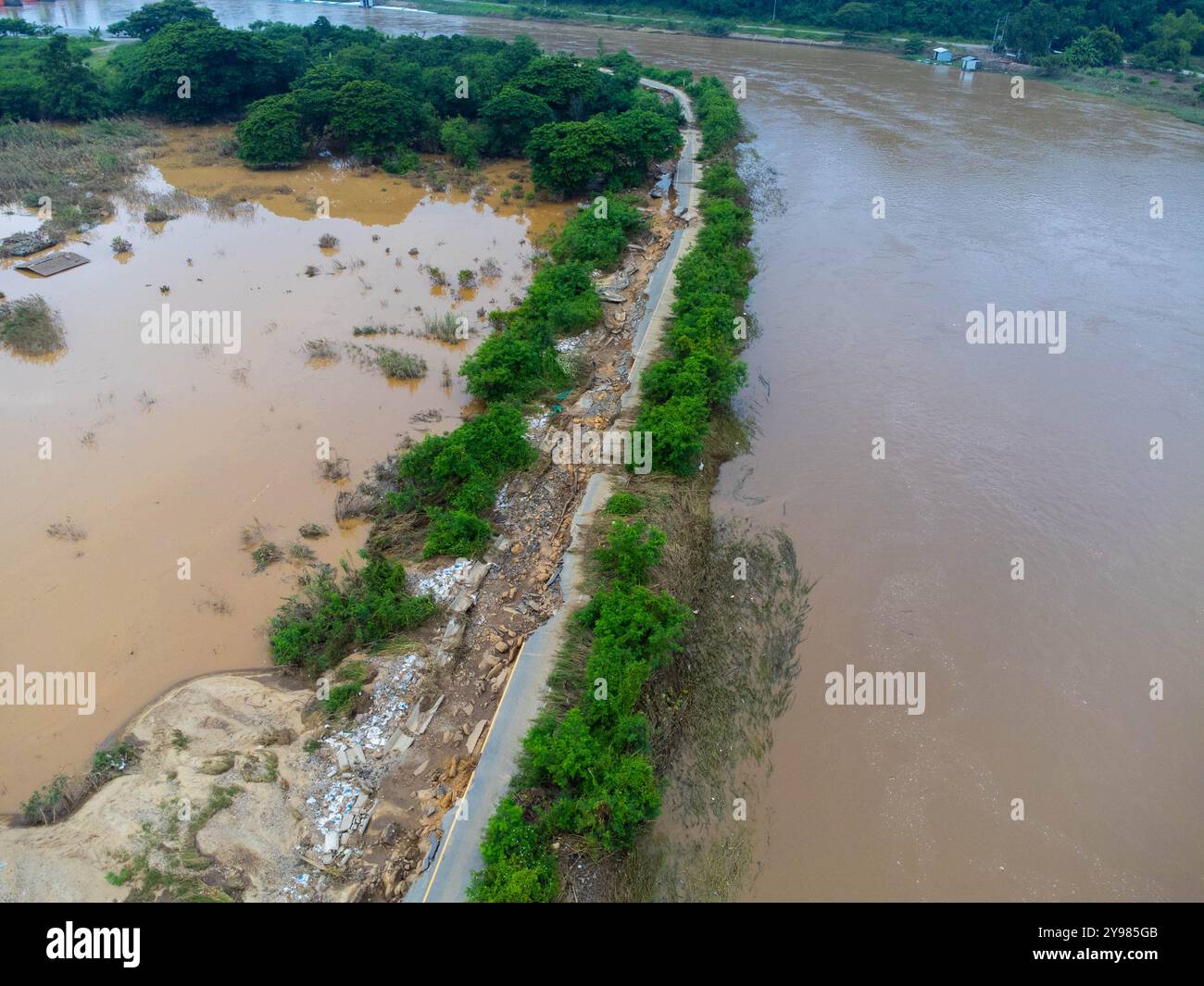 Landslides caused by heavy rains have caused the asphalt roads to crack ...