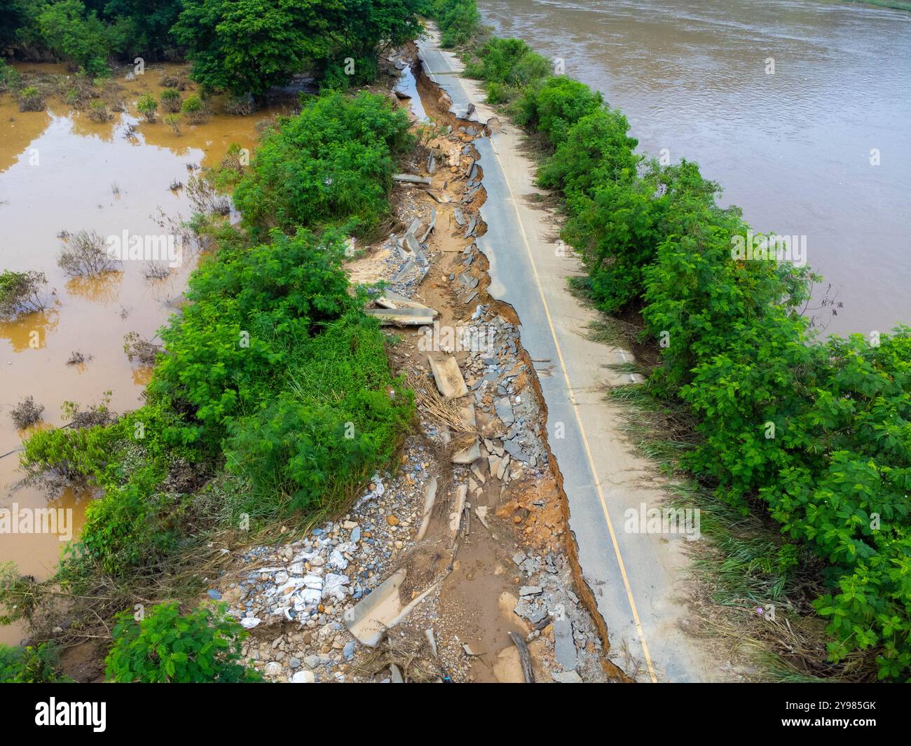 Landslides caused by heavy rains have caused the asphalt roads to crack ...
