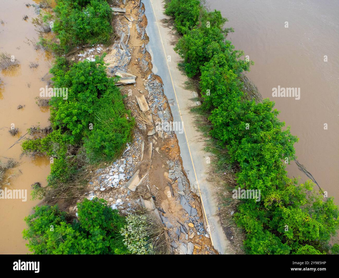 Landslides caused by heavy rains have caused the asphalt roads to crack ...