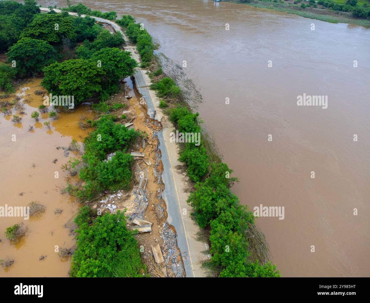 Landslides caused by heavy rains have caused the asphalt roads to crack ...