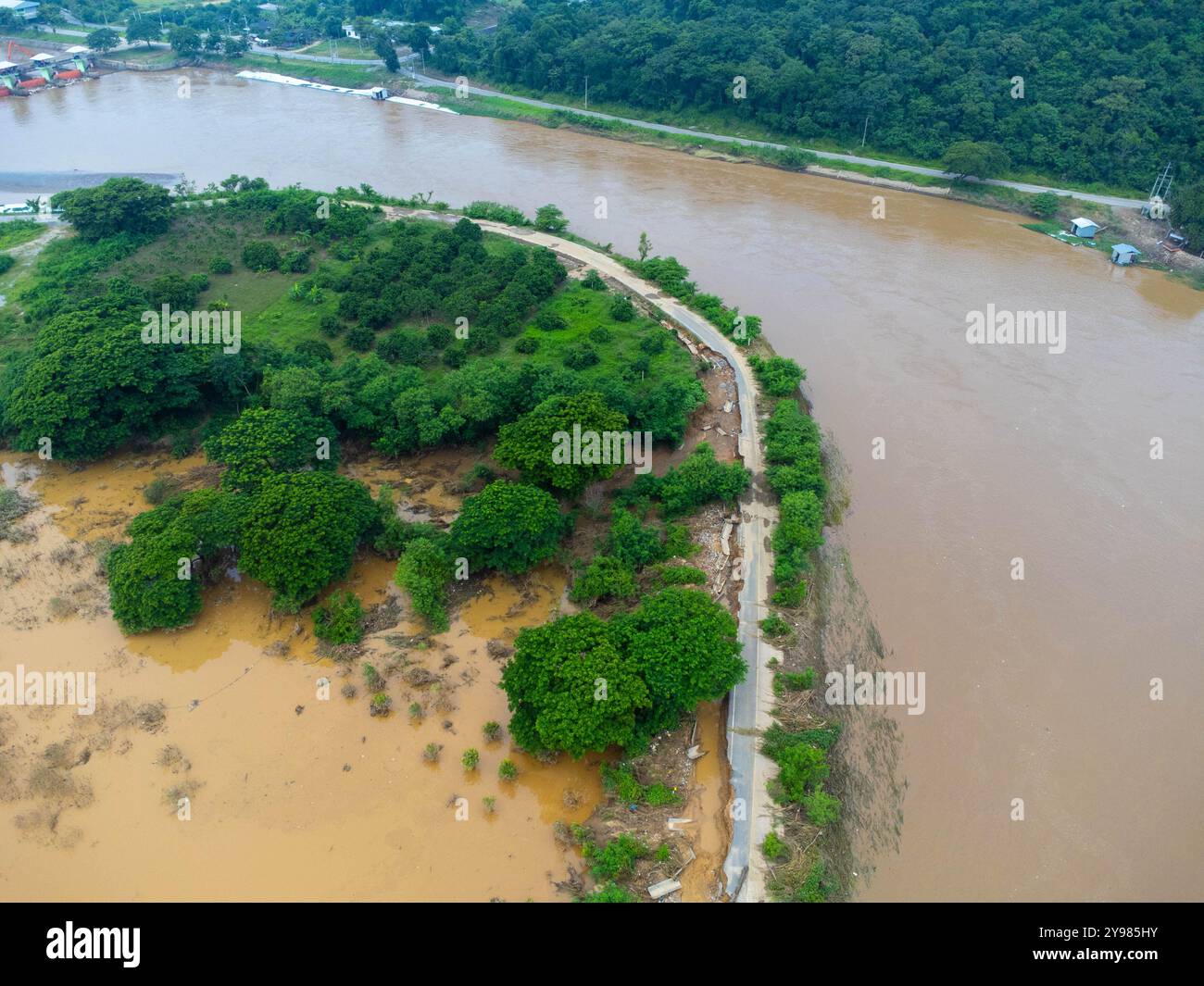 Landslides caused by heavy rains have caused the asphalt roads to crack ...