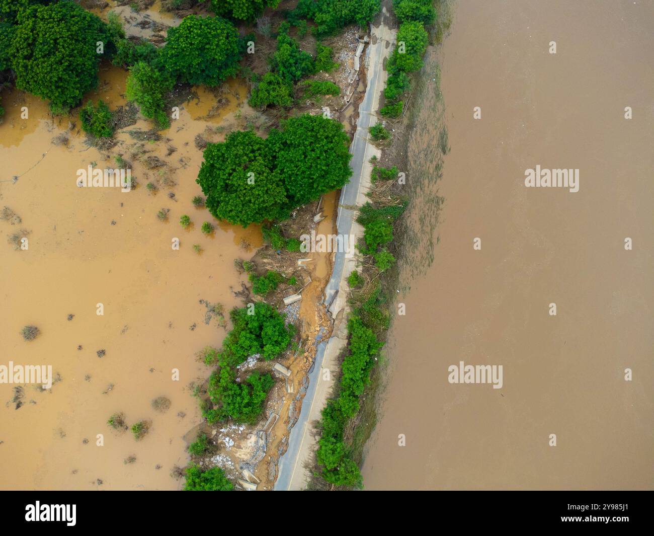 Landslides caused by heavy rains have caused the asphalt roads to crack ...