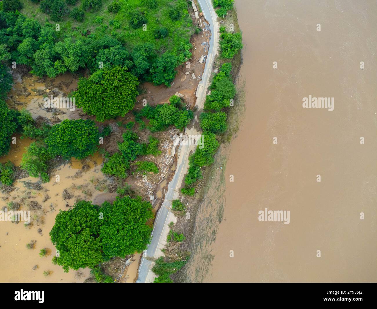 Landslides caused by heavy rains have caused the asphalt roads to crack ...