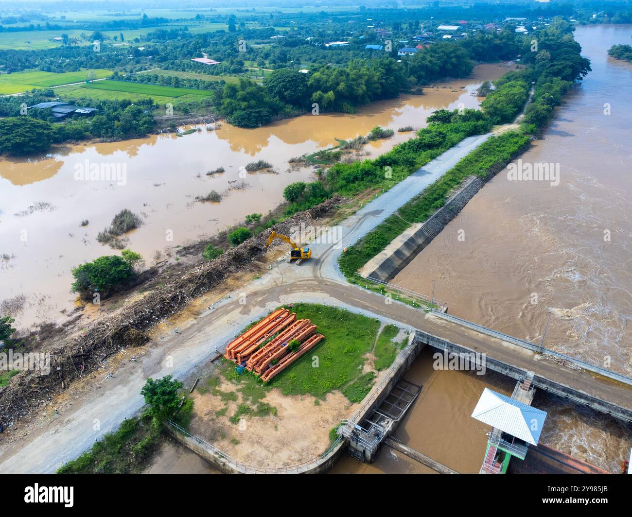 Landslides and natural disasters with excavators working on site ...
