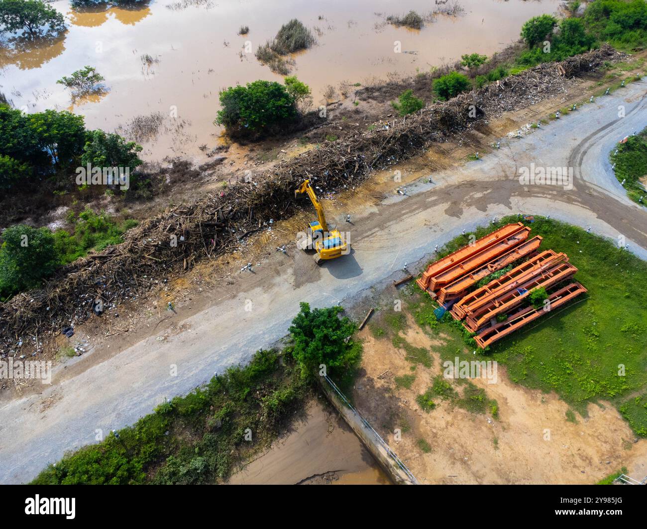 Landslides and natural disasters with excavators working on site ...