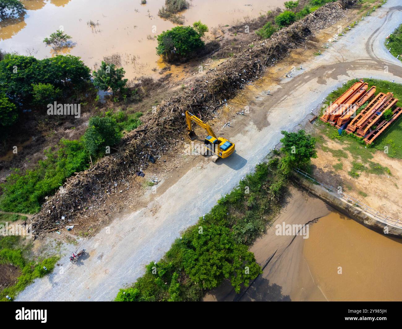 Landslides and natural disasters with excavators working on site ...