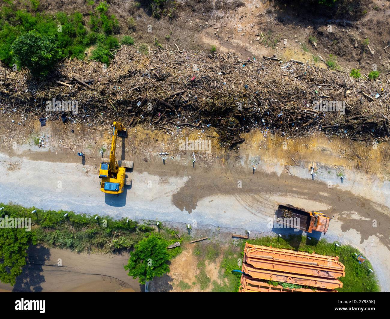 Landslides and natural disasters with excavators working on site ...