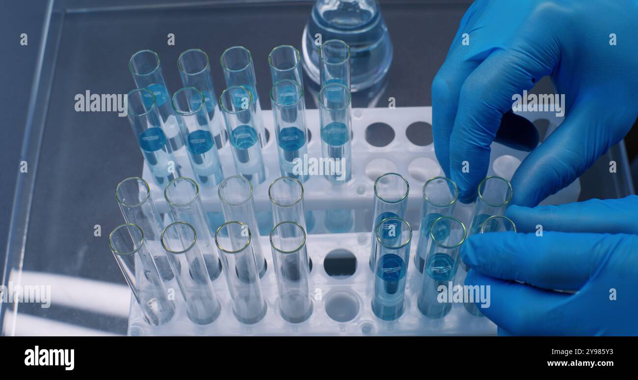 Advanced medical research laboratory: Close up of chemist or scientist ...