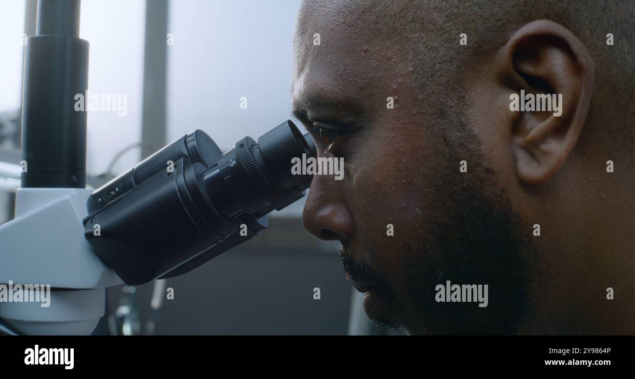 Medical science laboratory: Close up of African American male ...