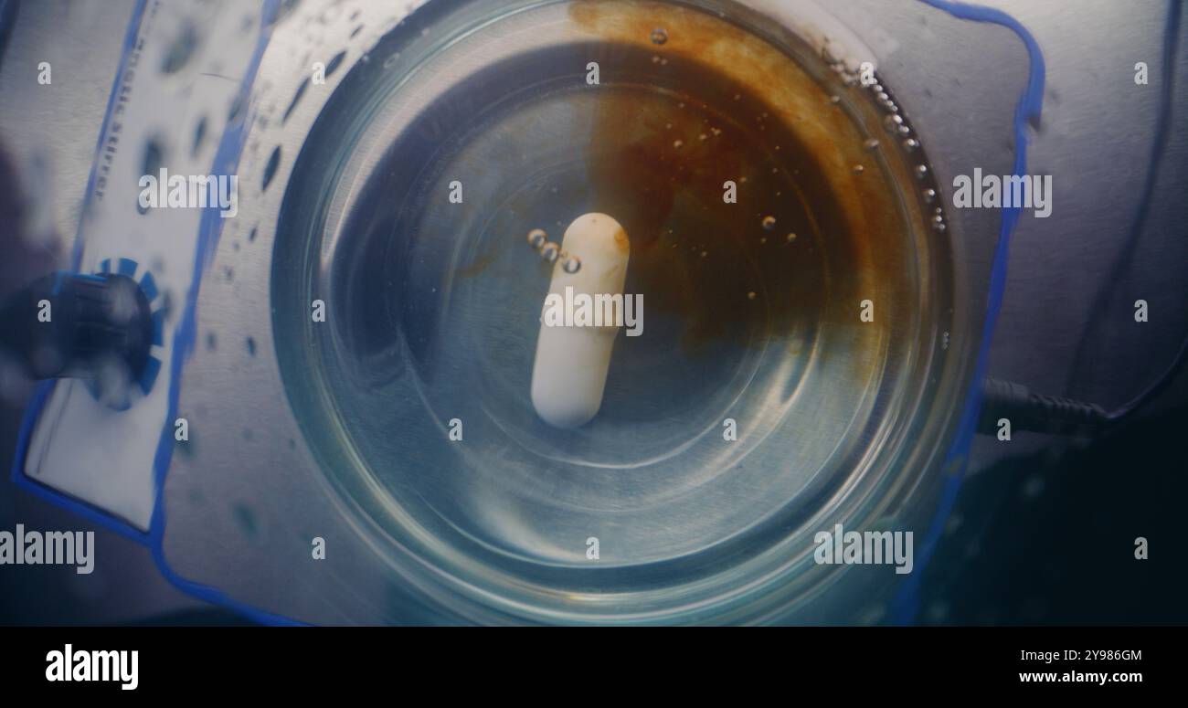 Medical science laboratory with modern equipment: Chemist adds liquid ...