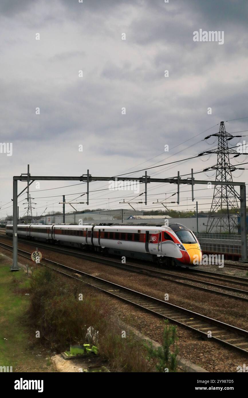 LNER Azuma Class 801 train, passing the Werrington Grade Separation ...