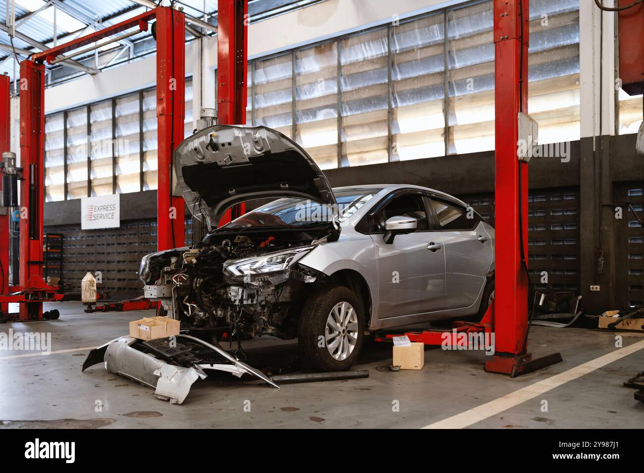 Car Maintenance Technician Working on Engine Stock Photo - Alamy