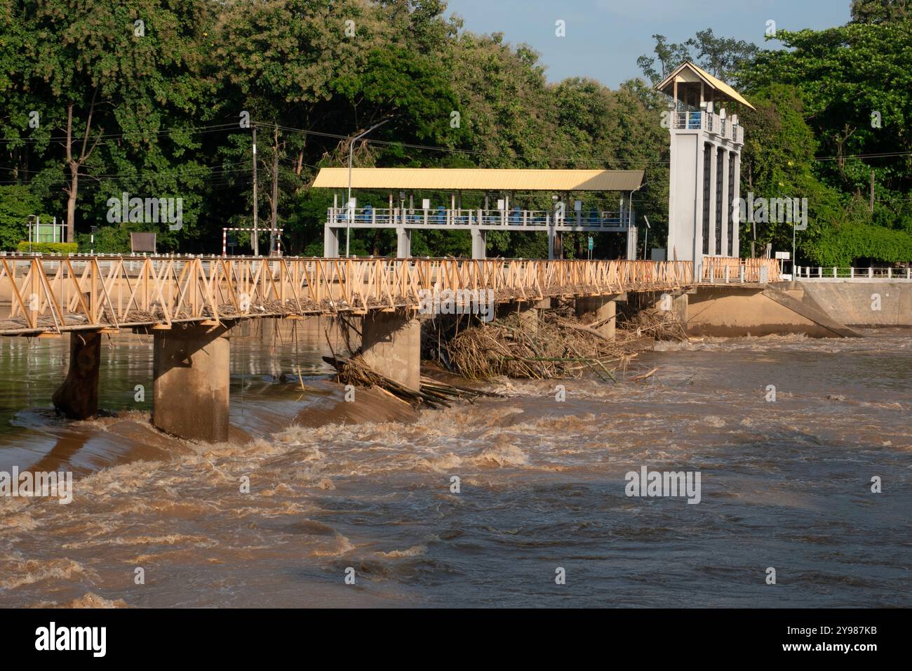 Debris from the violent flash floods stuck to the bridge Stock Photo ...