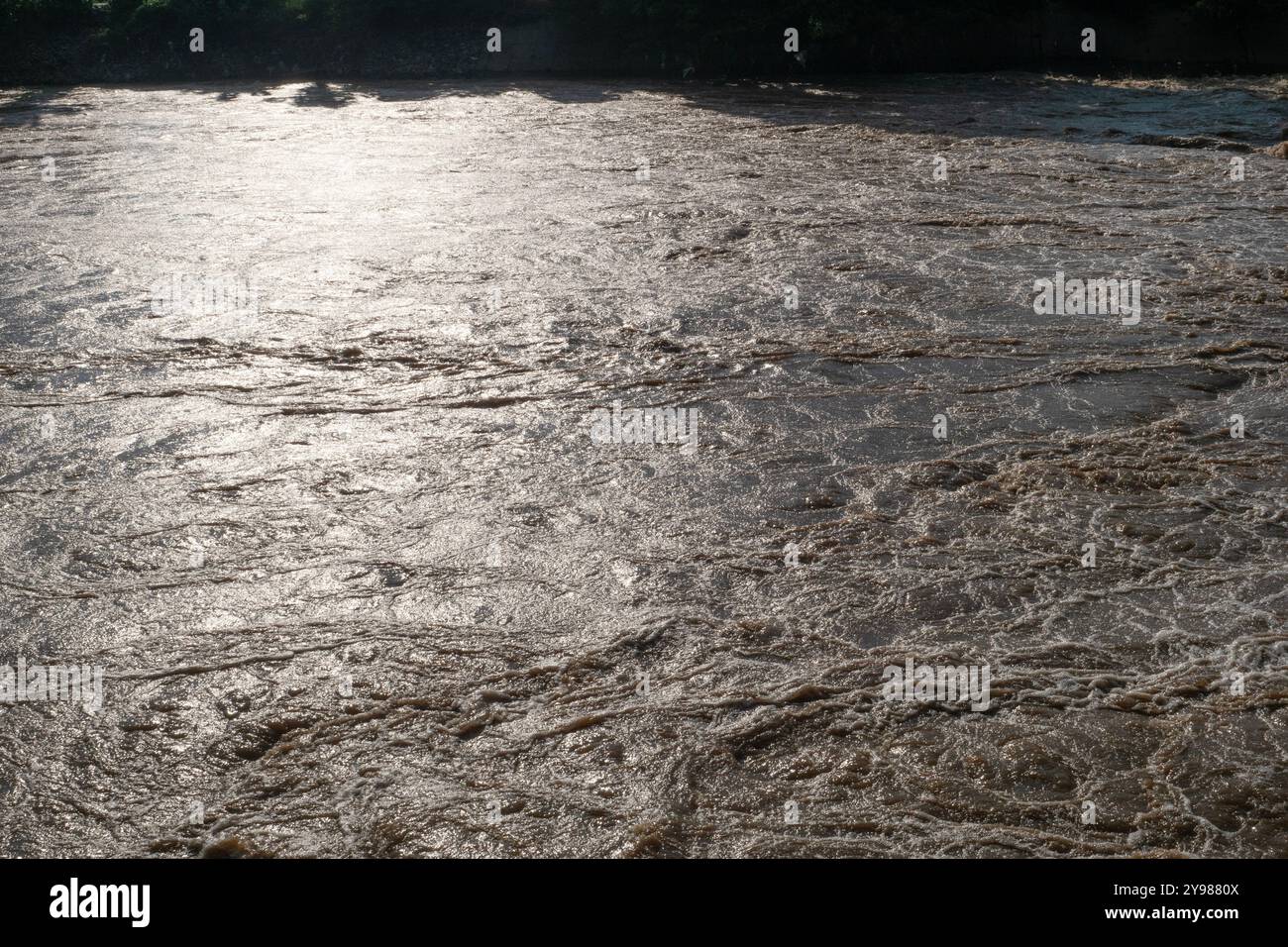 Flash floods flow from the mountains into the Ping River Stock Photo ...