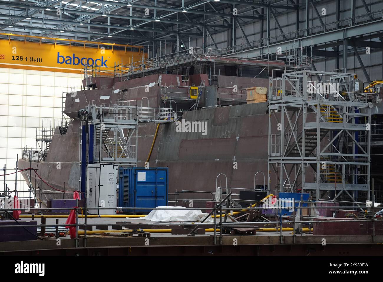 Construction work continues on HMS Venturer(top) and HMS Active in the ...